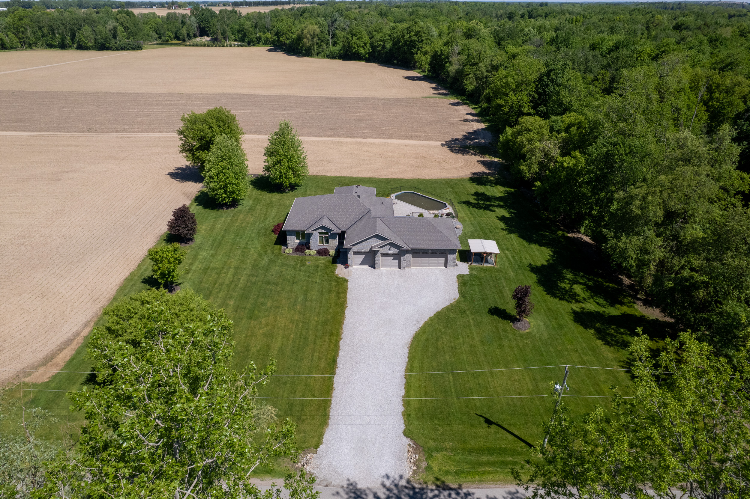 Fantastic custom built all brick home with a four-car attached garage ...