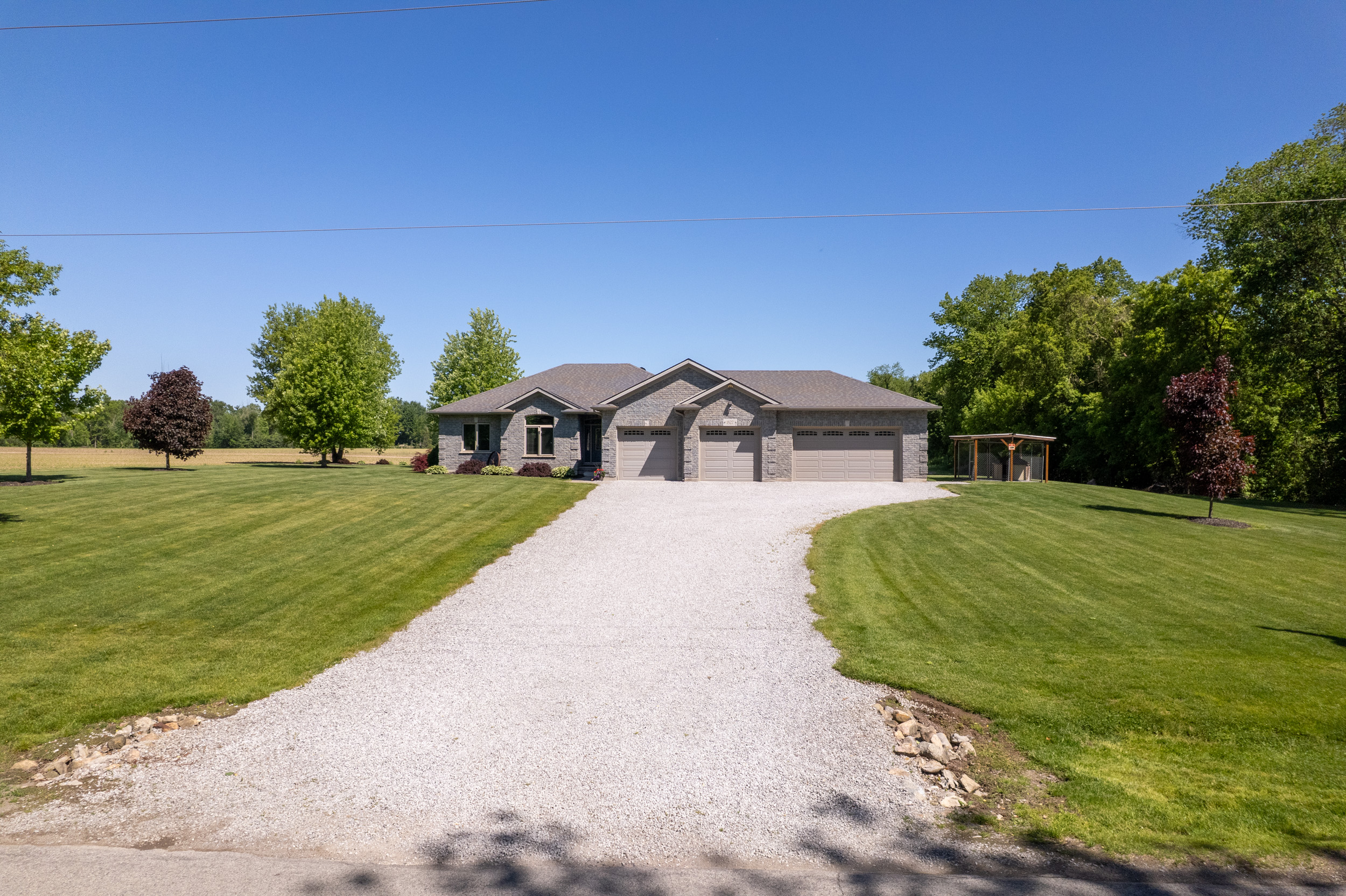 Fantastic custom built all brick home with a four-car attached garage ...