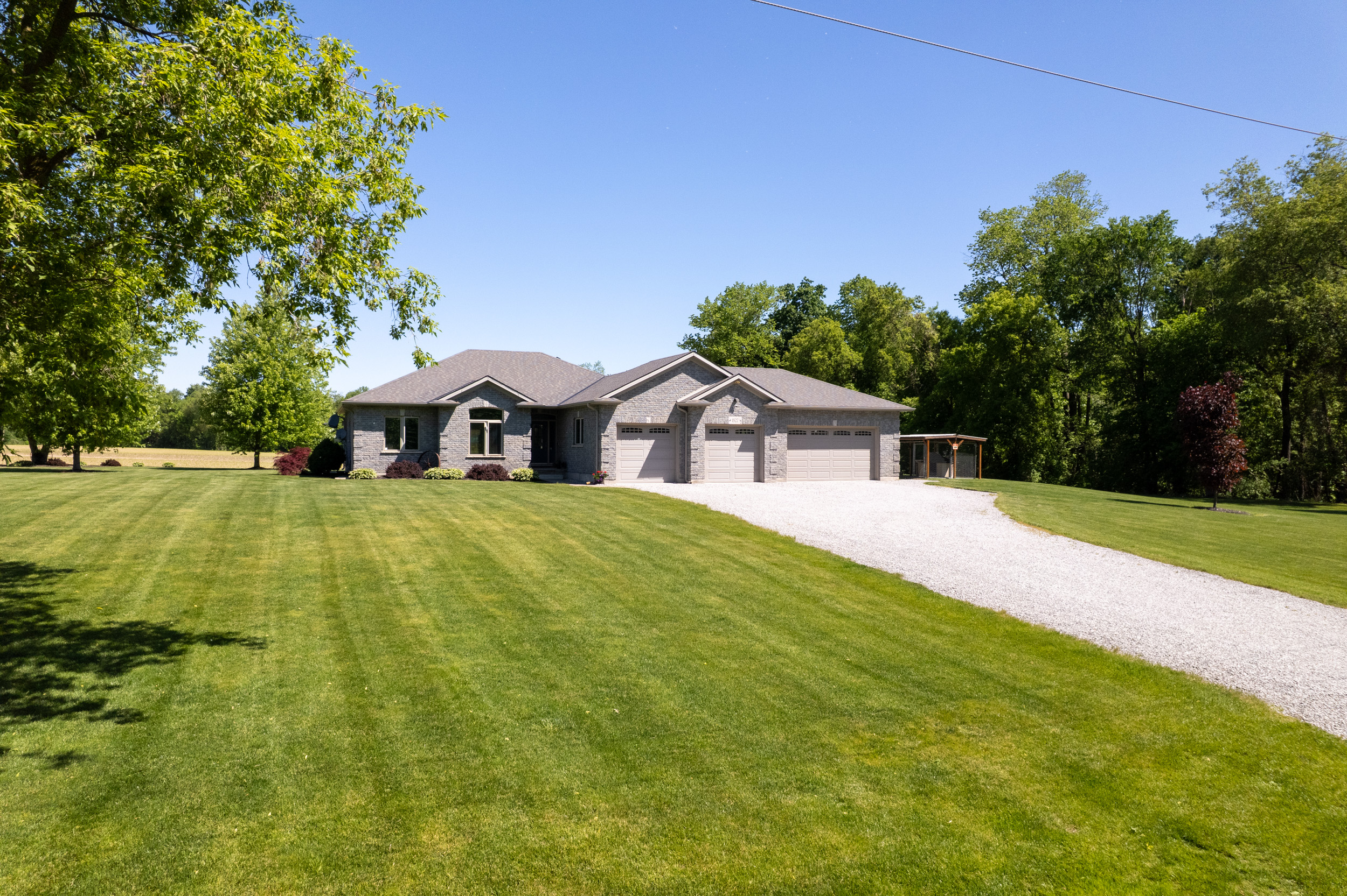 Fantastic custom built all brick home with a four-car attached garage ...
